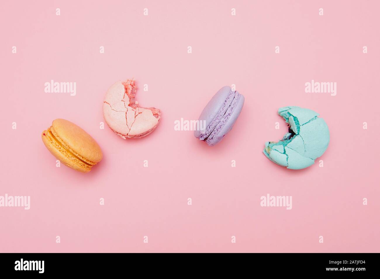 Colorful Cake macaron or macaroon on pink background, pastel color ...
