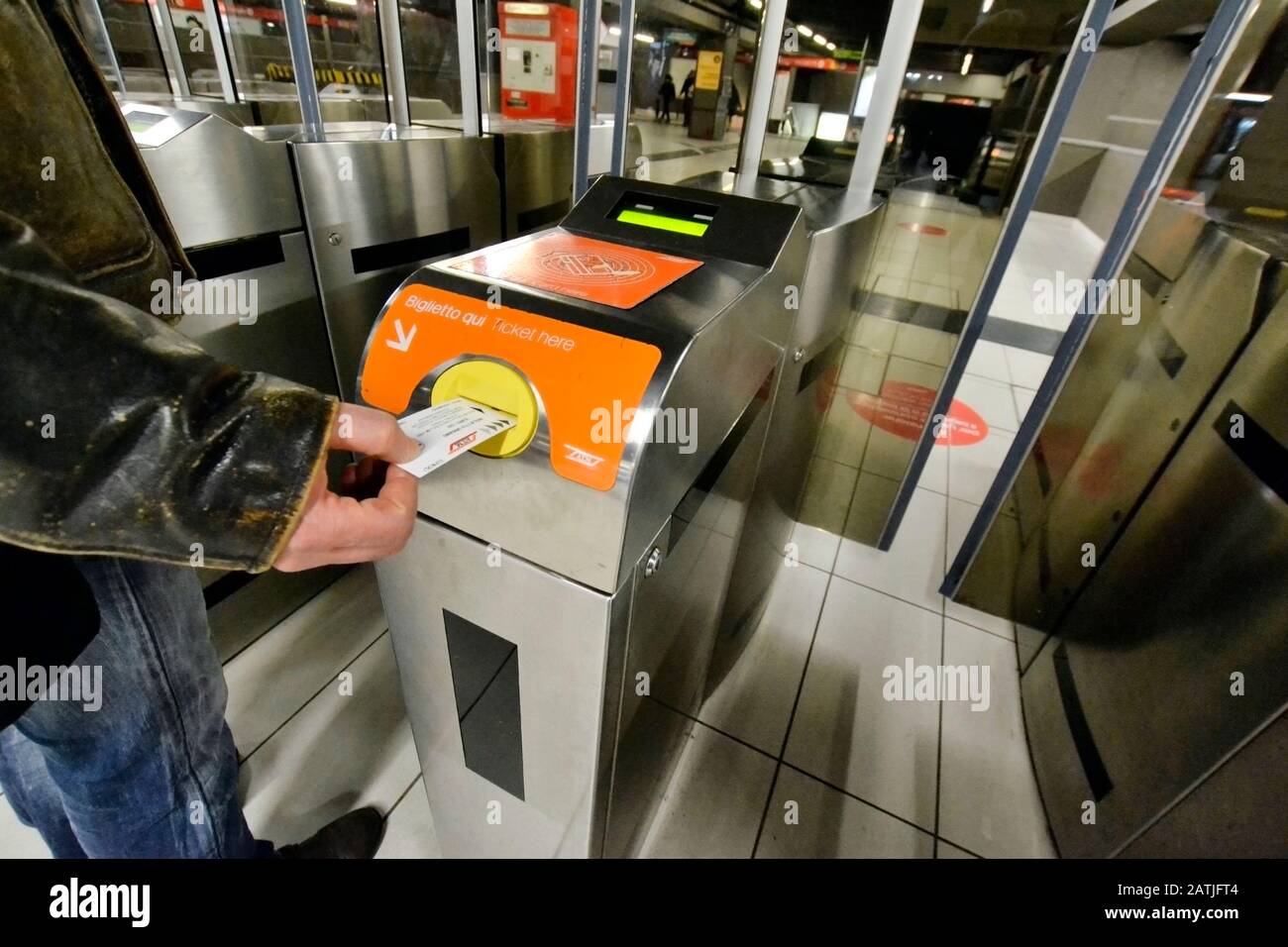 Ticket control barrier on a subway station, Milan, Italy Stock Photo ...