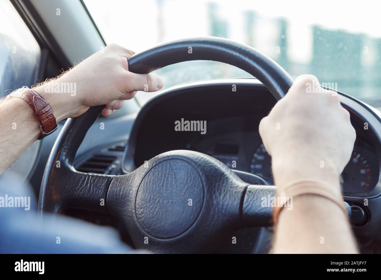 Human hands on wheel hi-res stock photography and images - Alamy