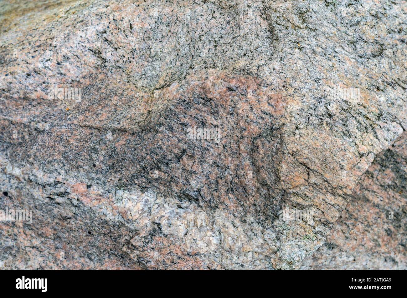 Closeup of multi-colored rock texture with plenty of cracks Stock Photo ...