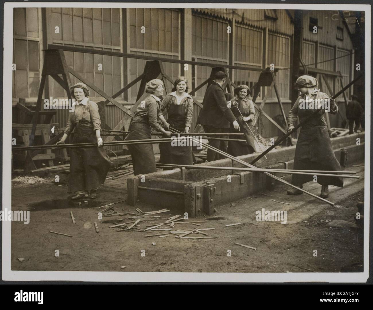 Description: Journalists visit naval shipbuilding tard. Women workers ...