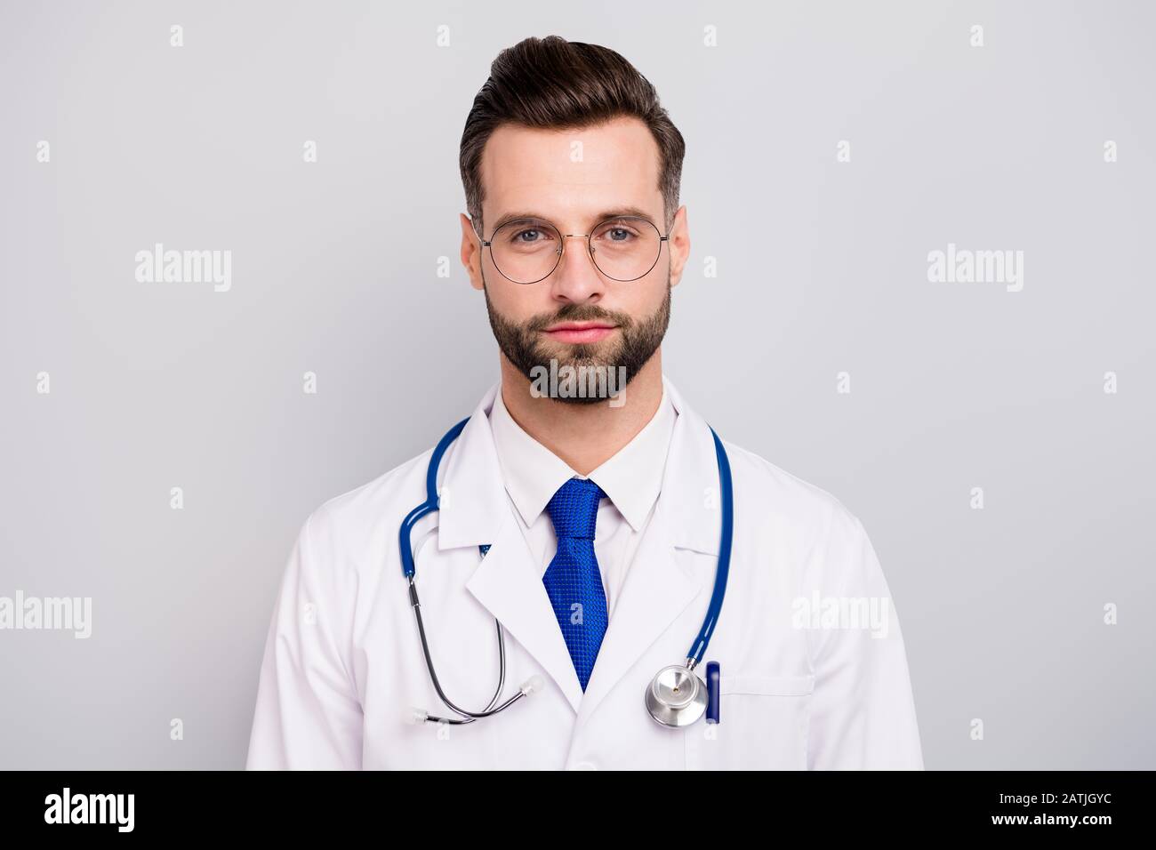 calm doctor or professor with stethoscope Stock Photo - Alamy
