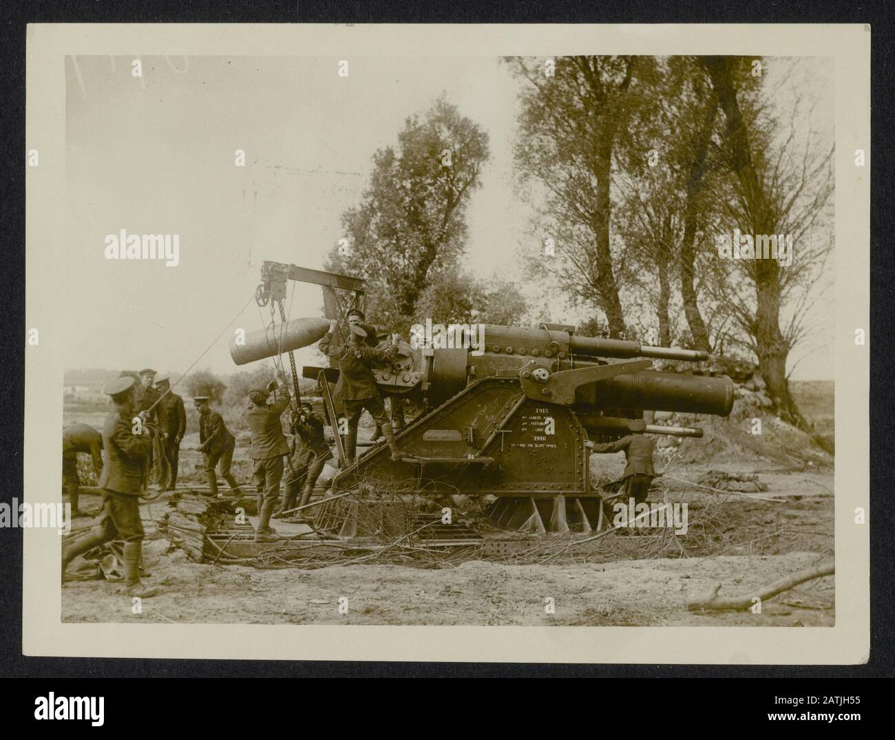 With the Canadians in the great battle Description: Loading a heavy ...