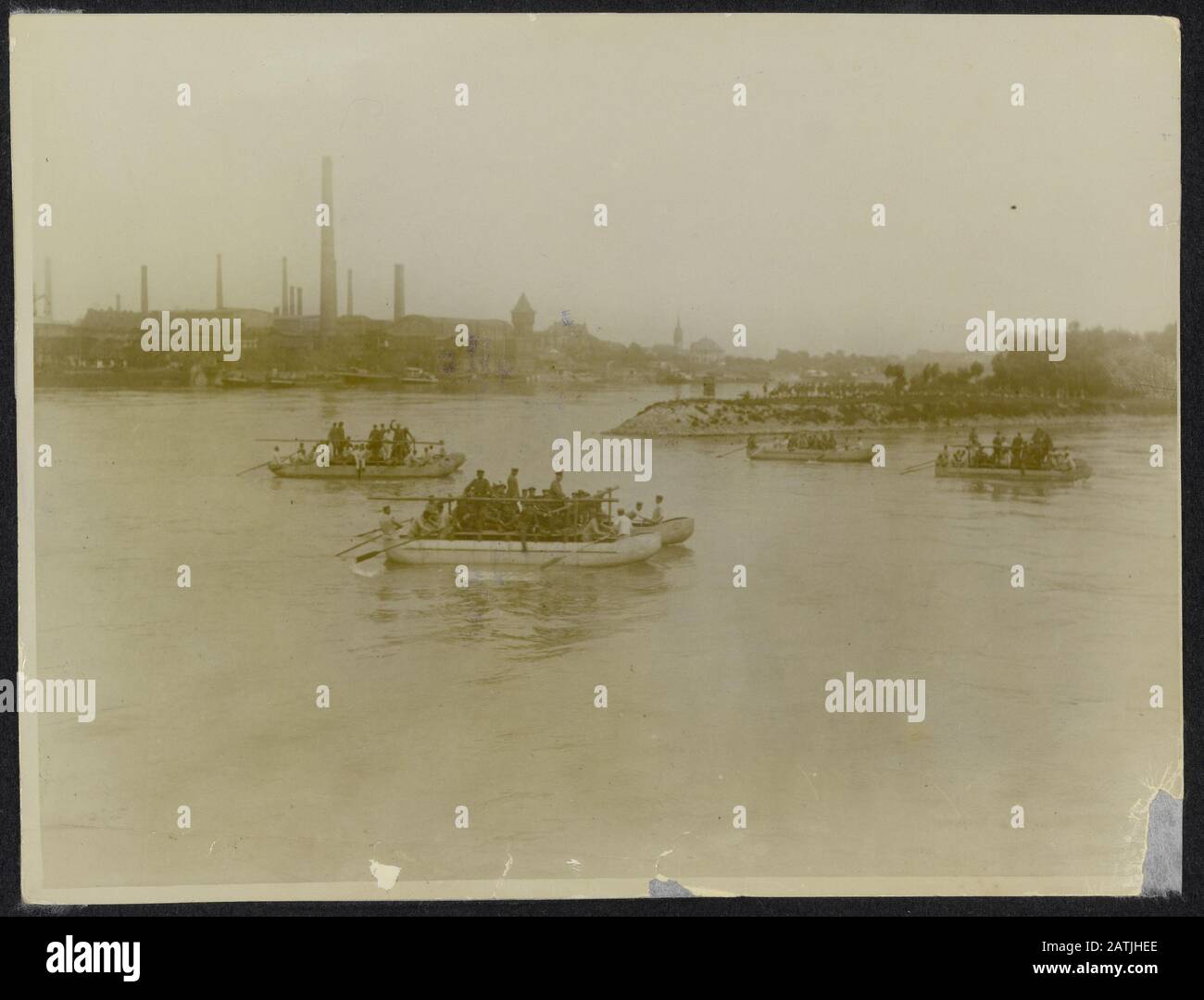 Description: Soldiers rowing boats in a harbor. Date: {1914-1918 ...