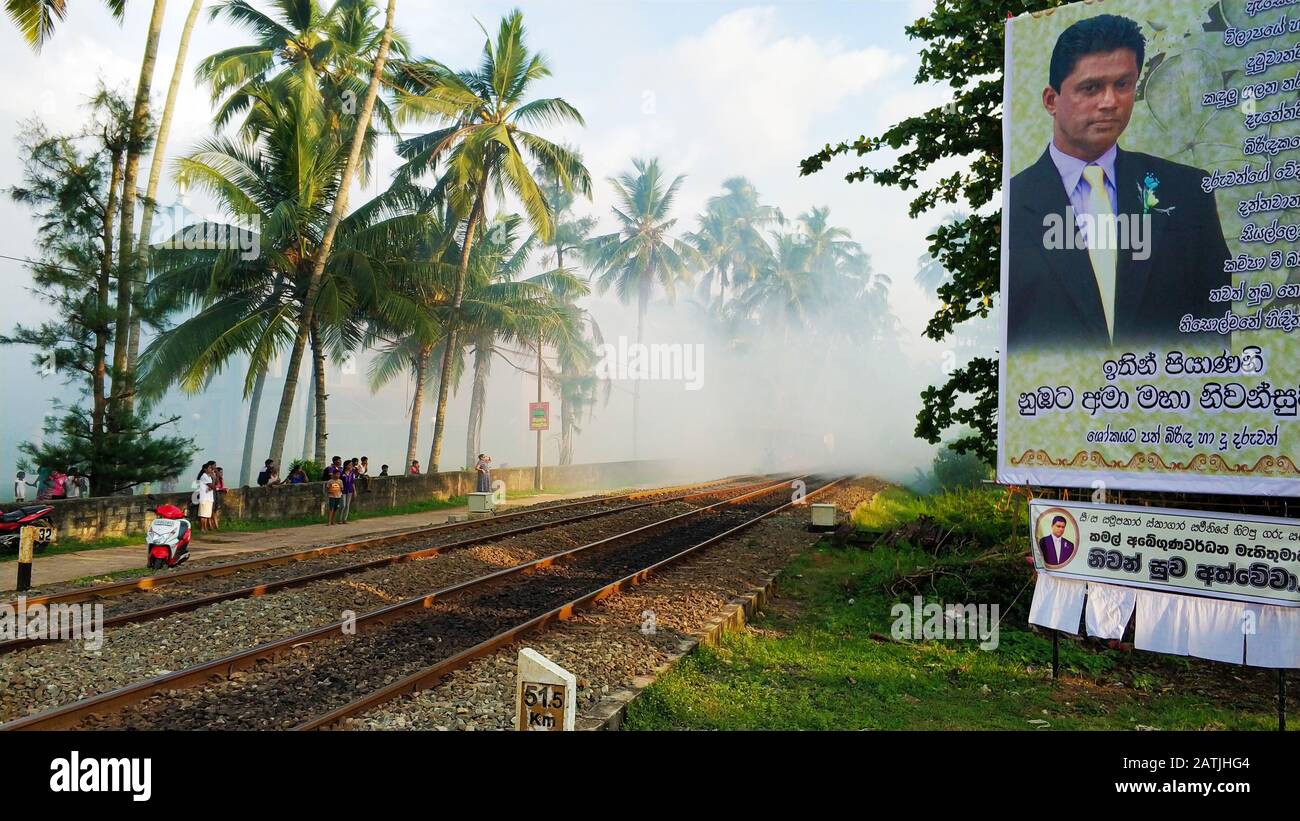 A cloud of smoke over the railway after the train passed Stock Photo ...