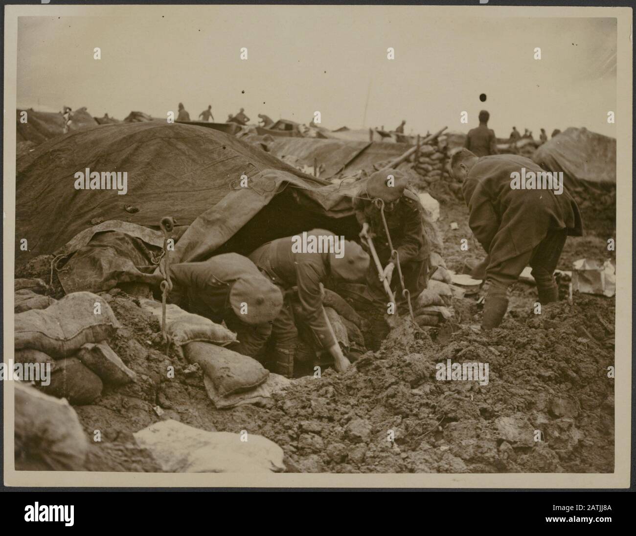 The front in France Description: Officers dig a dug out Annotation: The ...