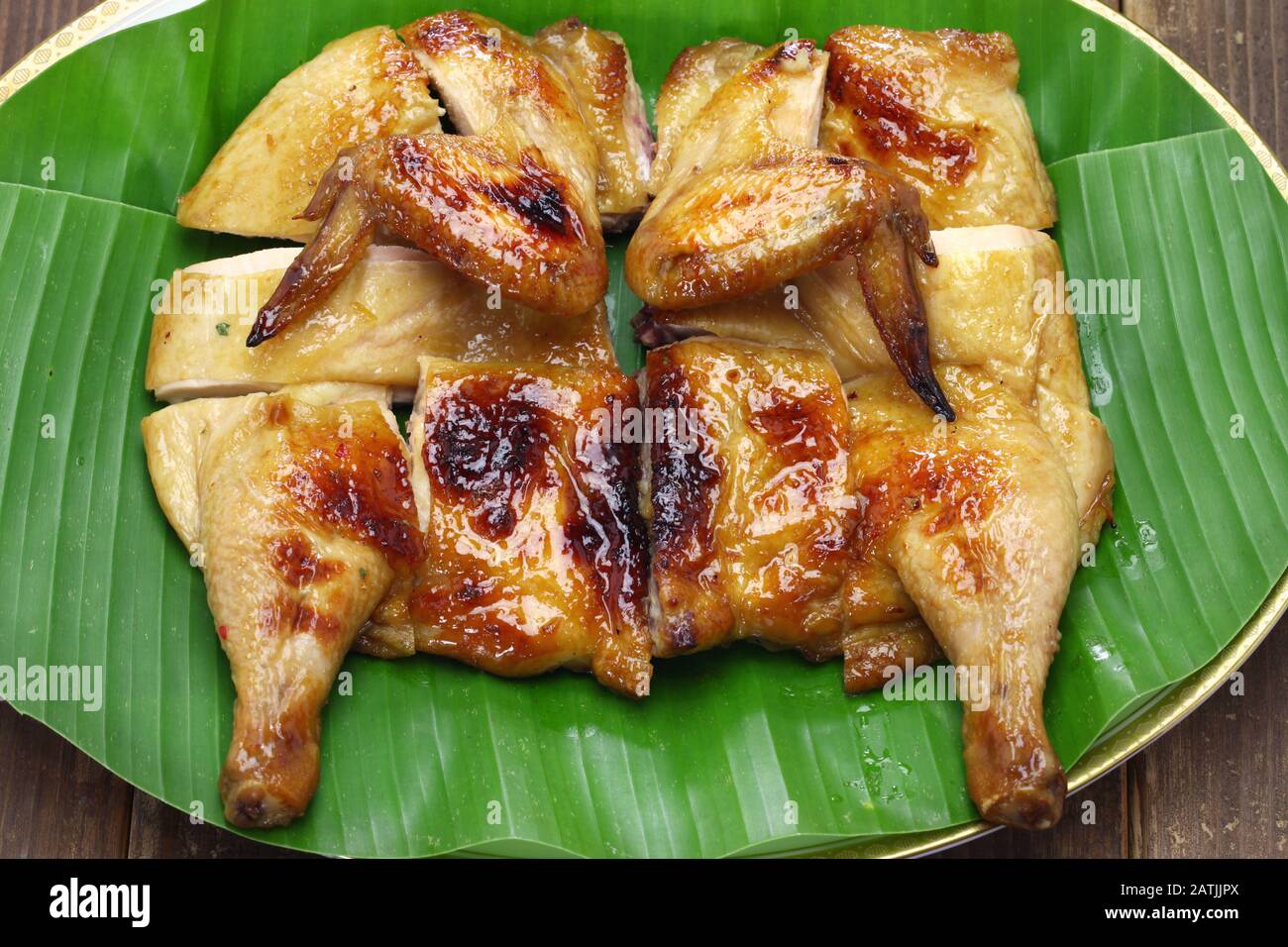 homemade gai yang, thai style grilled chicken Stock Photo - Alamy