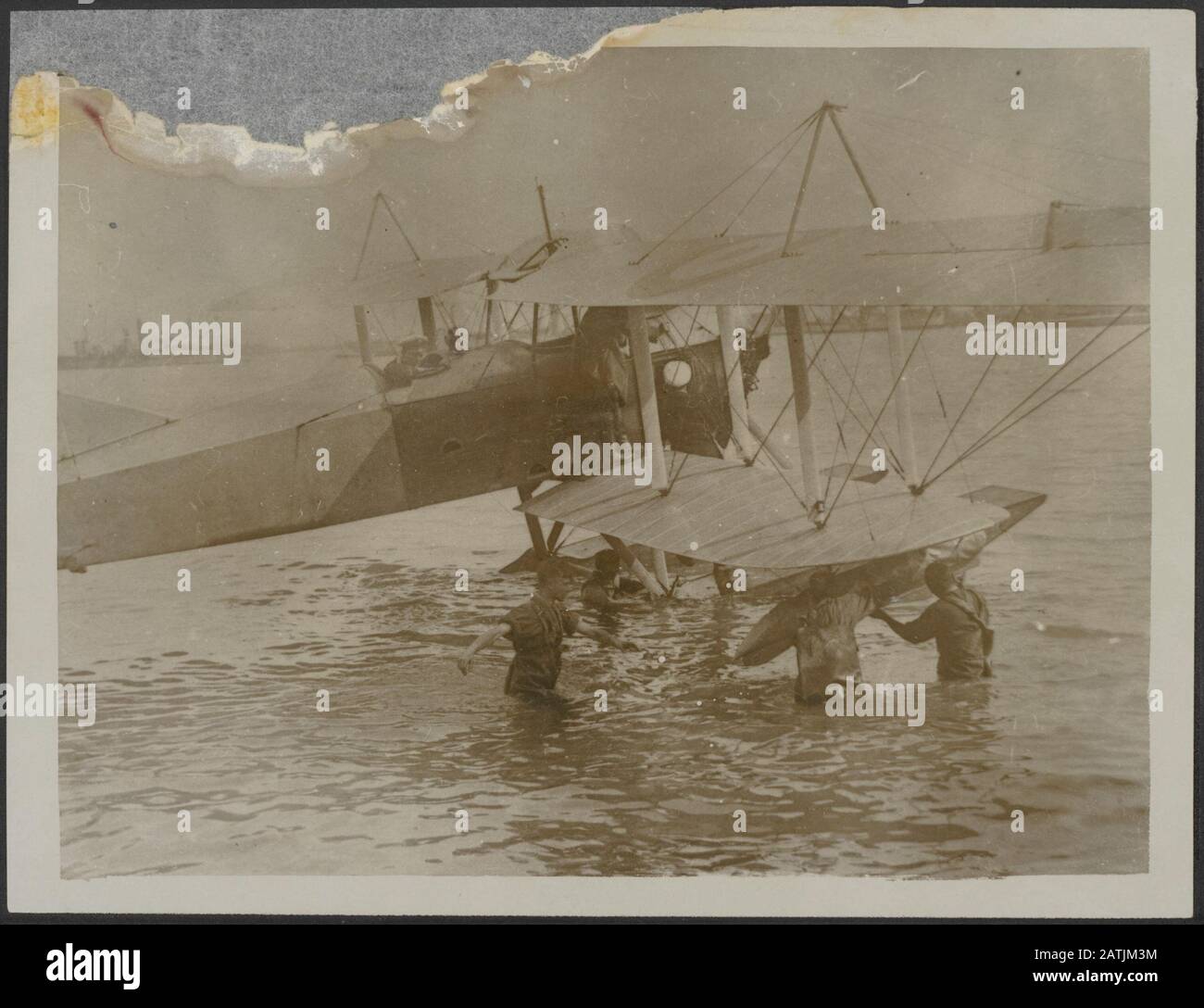 With the British navy in war time Description: Seaplane preparing for a ...