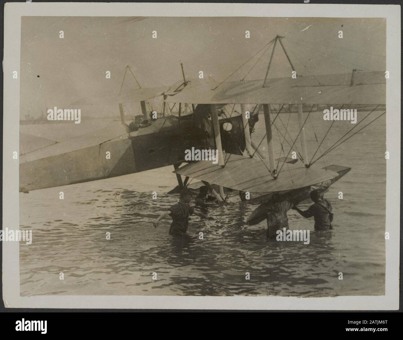 With the British navy in war time Description: Seaplane preparing for a ...