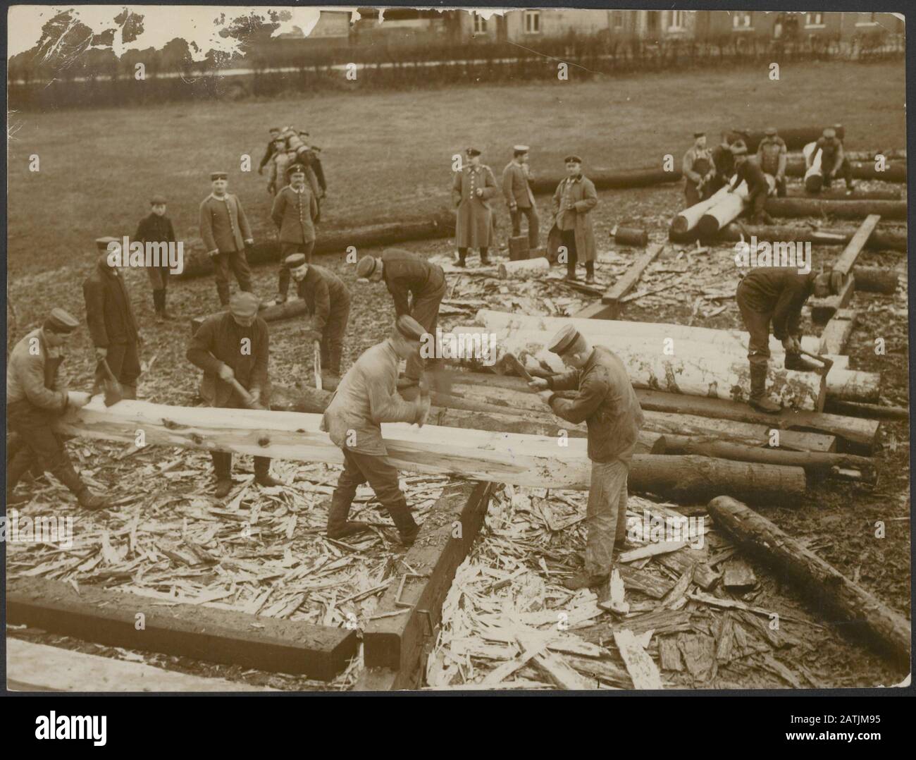 Description: Soldiers edit felled trees into beams. Date: {1914-1918 ...