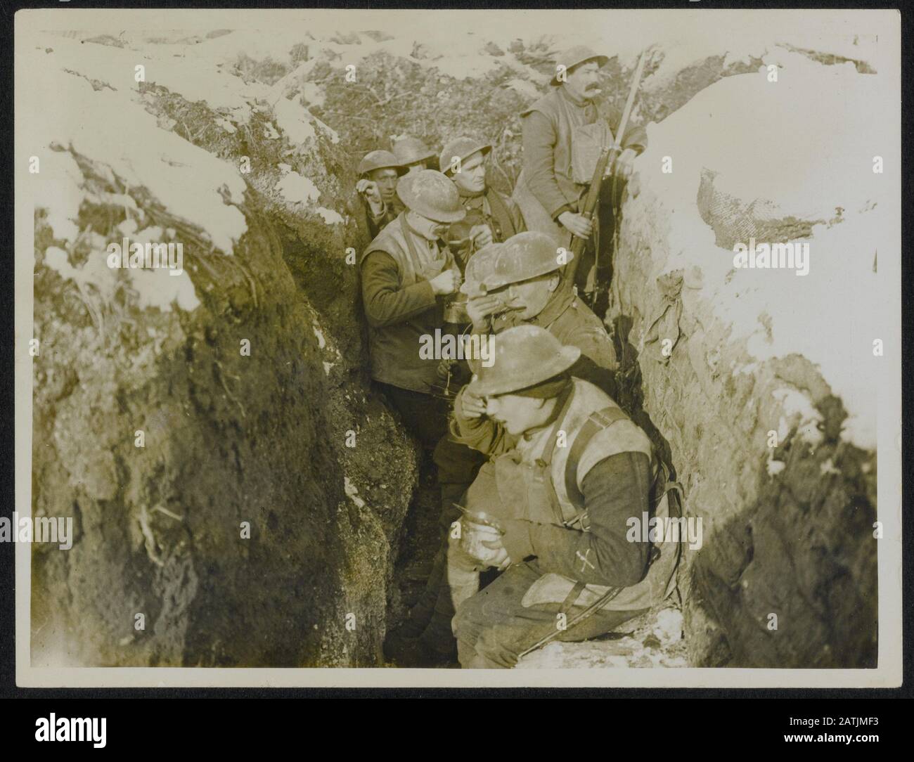 The western front. How Tommy is fed description: Some Tommies eating in ...