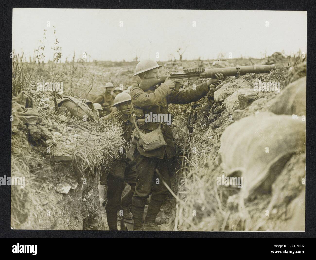 The British advance in the West Description: A Lewis gun in action in a ...