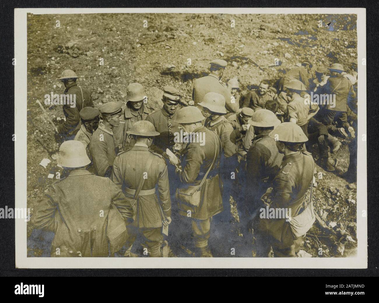 Canadian official photographs Description: Taking particulars of ...