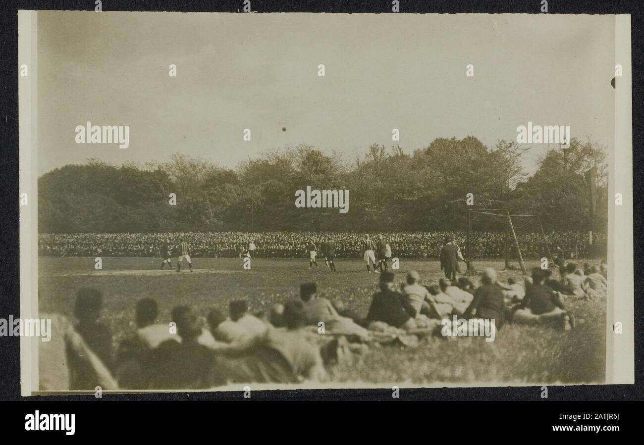 Description: Football with many public Date: {1914-1918} Keywords: WWI ...