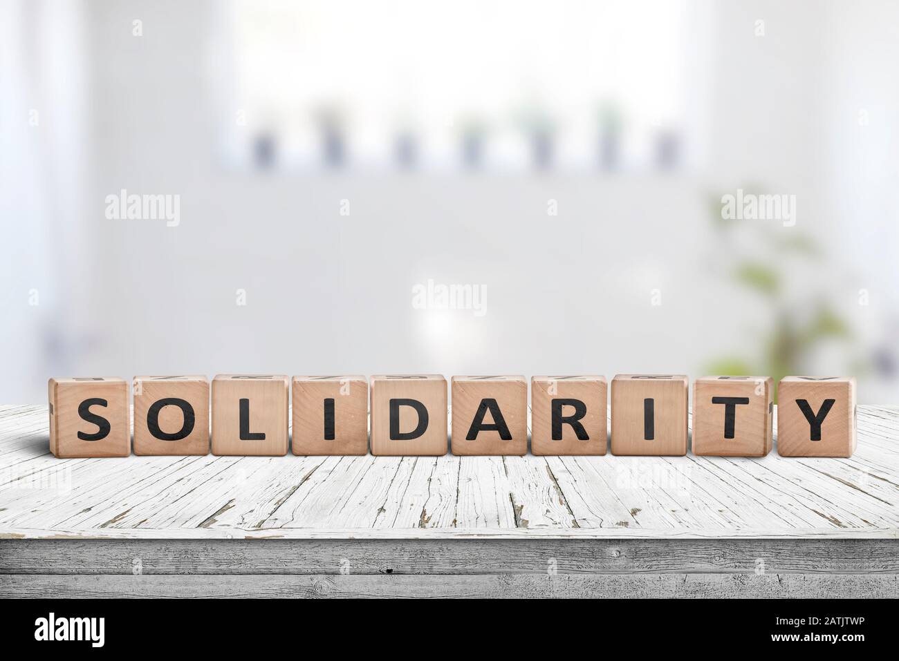 Solidarity message on a wooden table in a bright living room Stock ...