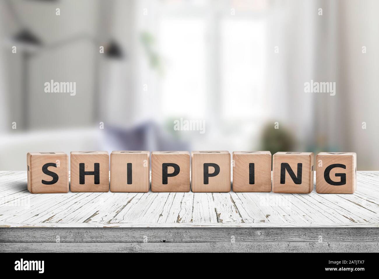 Shipping sign on a wooden desk in a bright living room with daylight ...