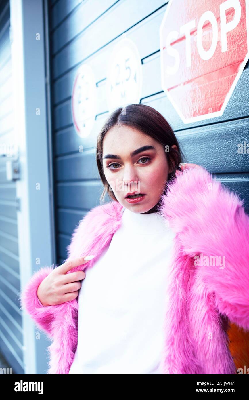 young cute girl teenager gesturing hanging around city parking and ...