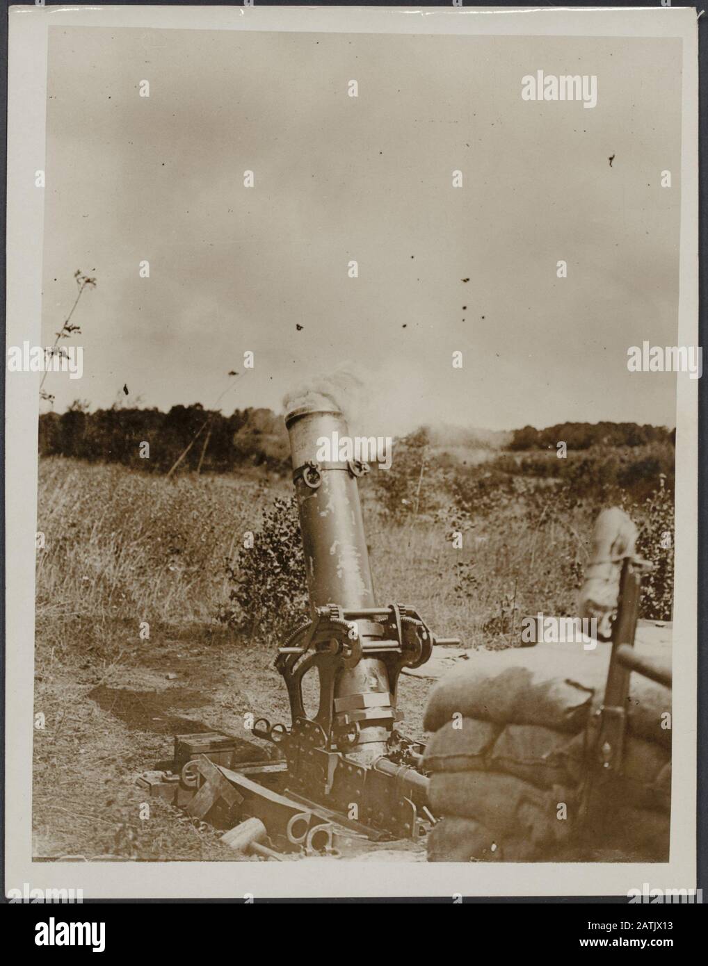 The British Western Front Description: Firing a heavy trench mortar ...