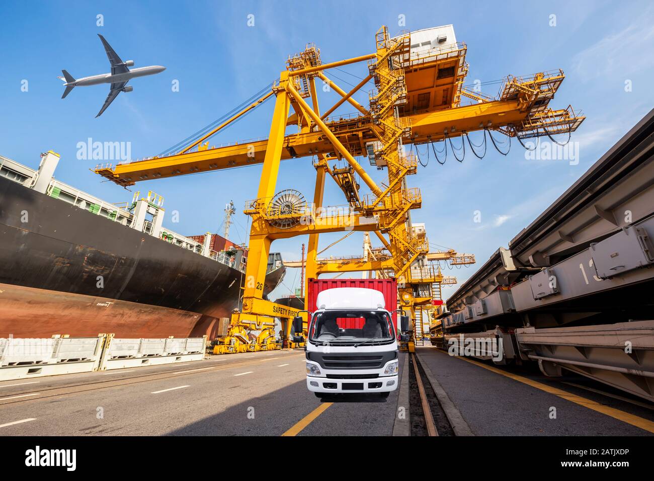 Container Cargo freight ship with working crane loading bridge in ...