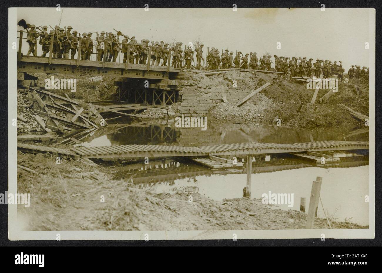 Description: British military unit pulls over a temporary bridge. Date ...