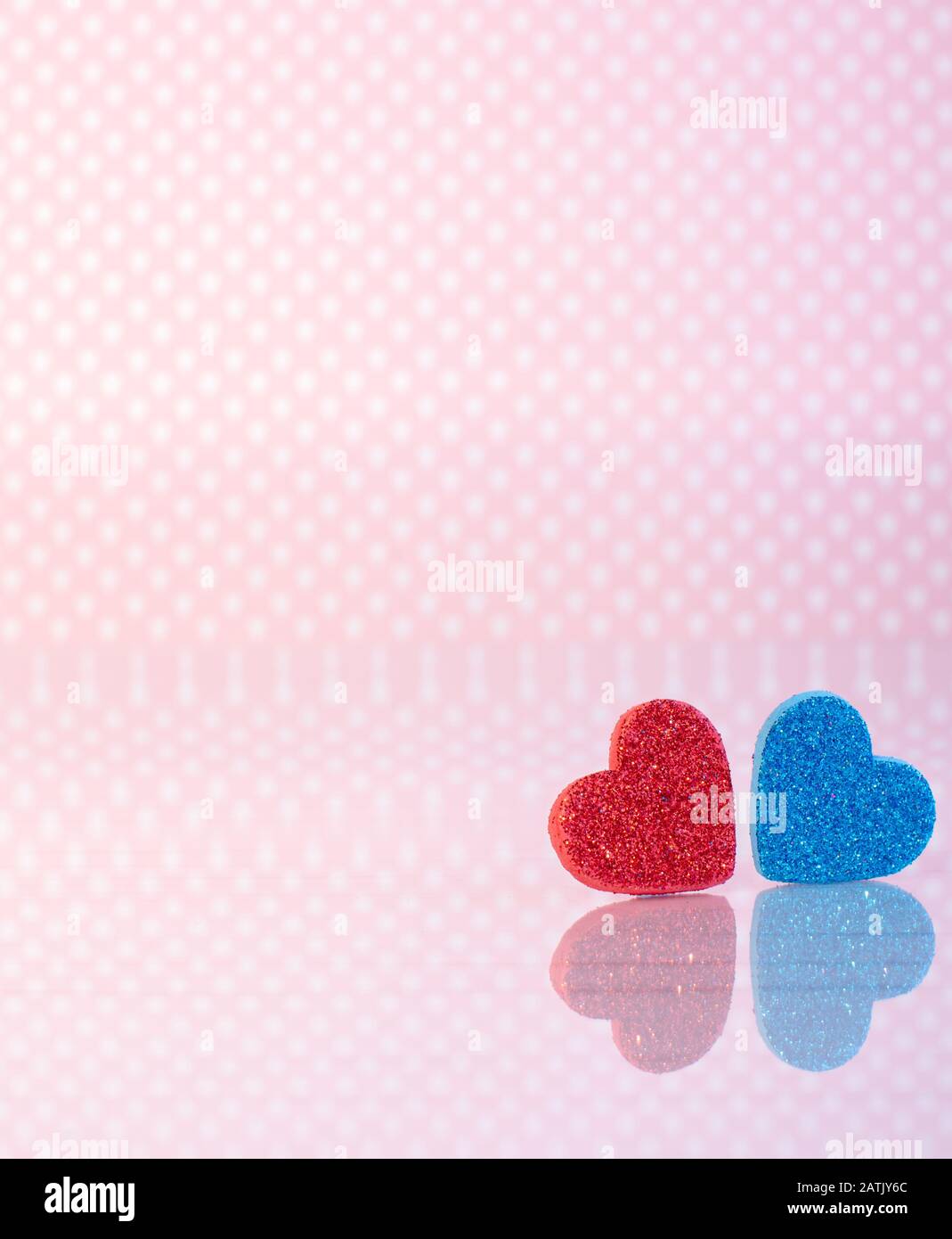Valentines background. Red and blue Heart on table with reflection on ...