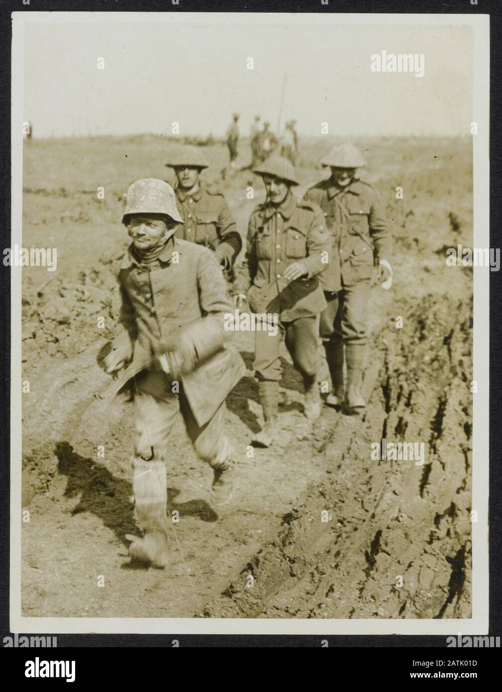 The Western Front Description: A Boche prisoner running back to get out ...