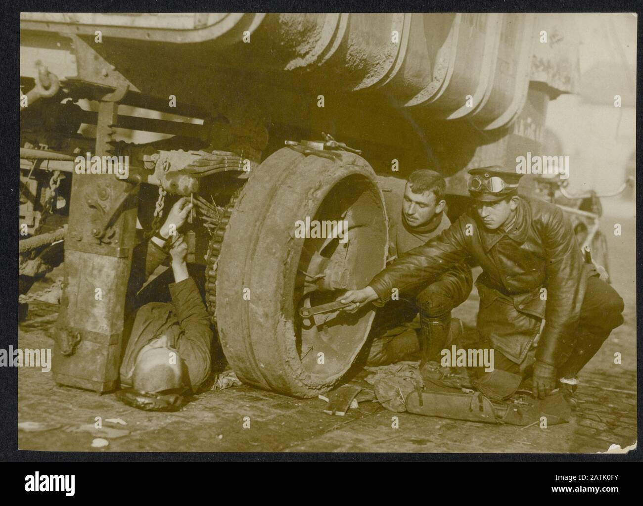 Description: German soldiers repairing a heavy truck Date: {1914-1918 ...