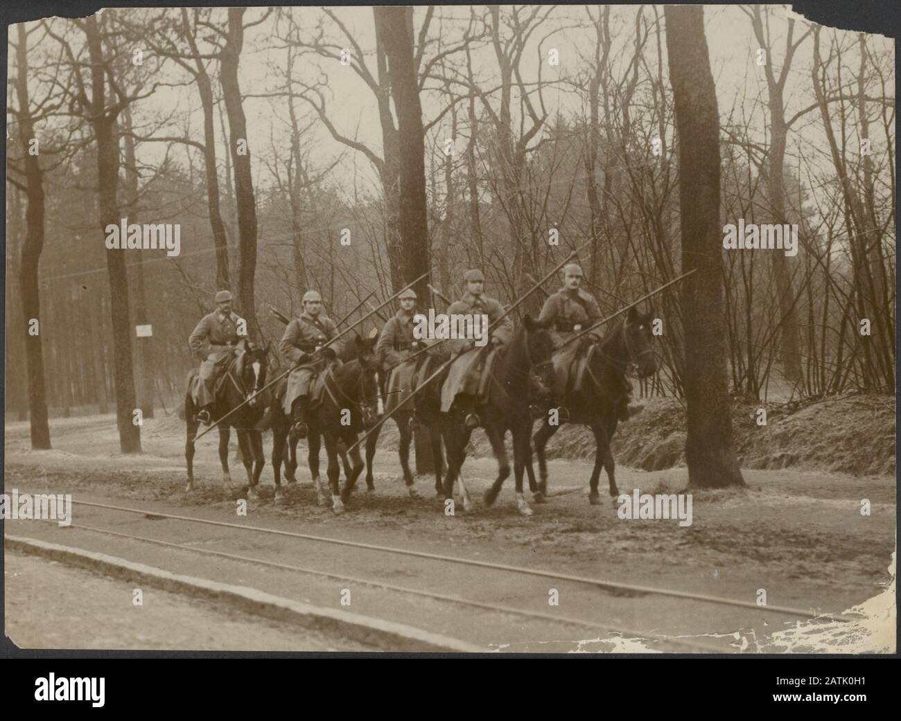 Description: German Uhlans driving along a forest path Date: {1914-1918 ...
