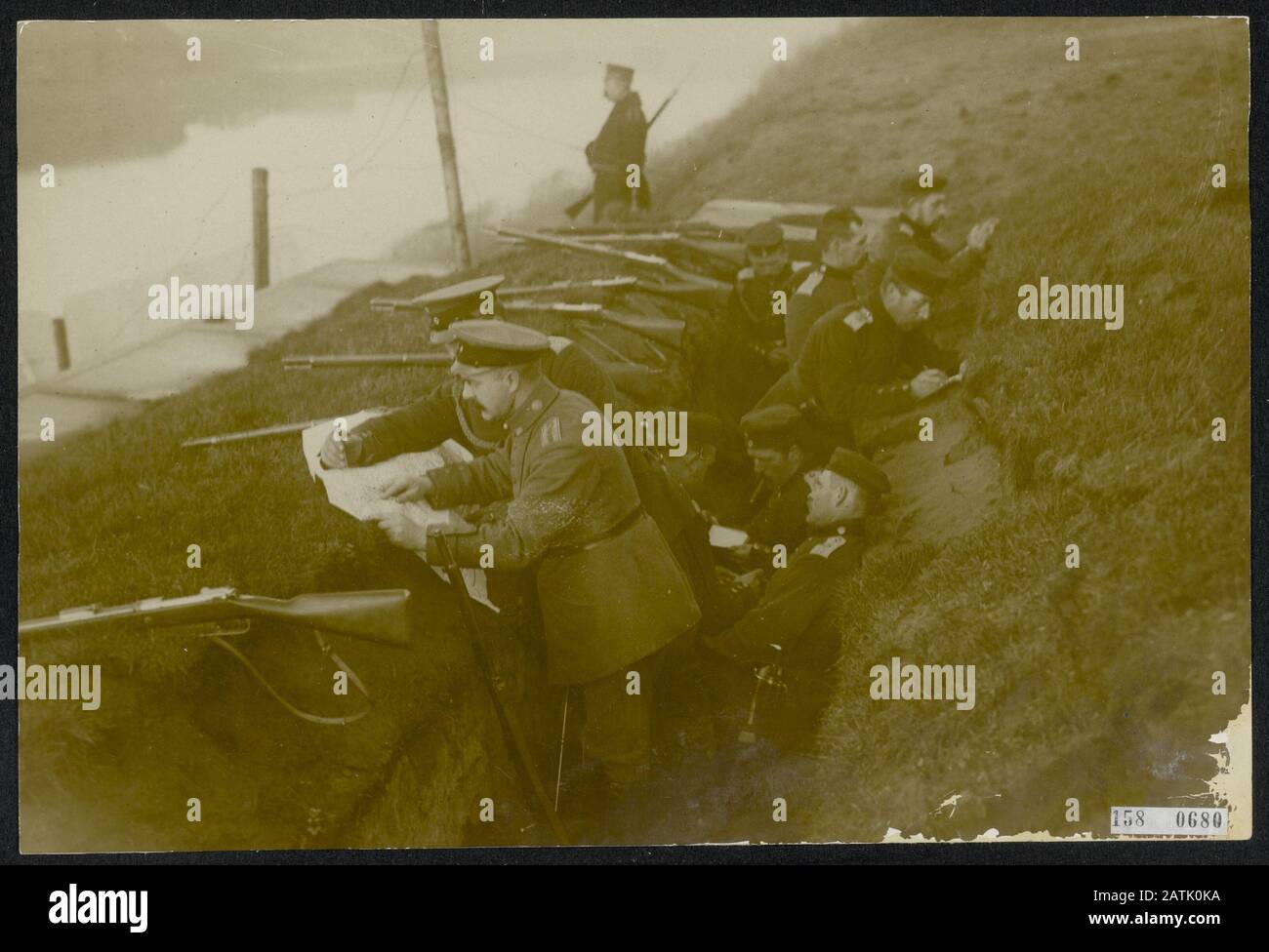Description: German soldiers in contention in a trench in a river ...