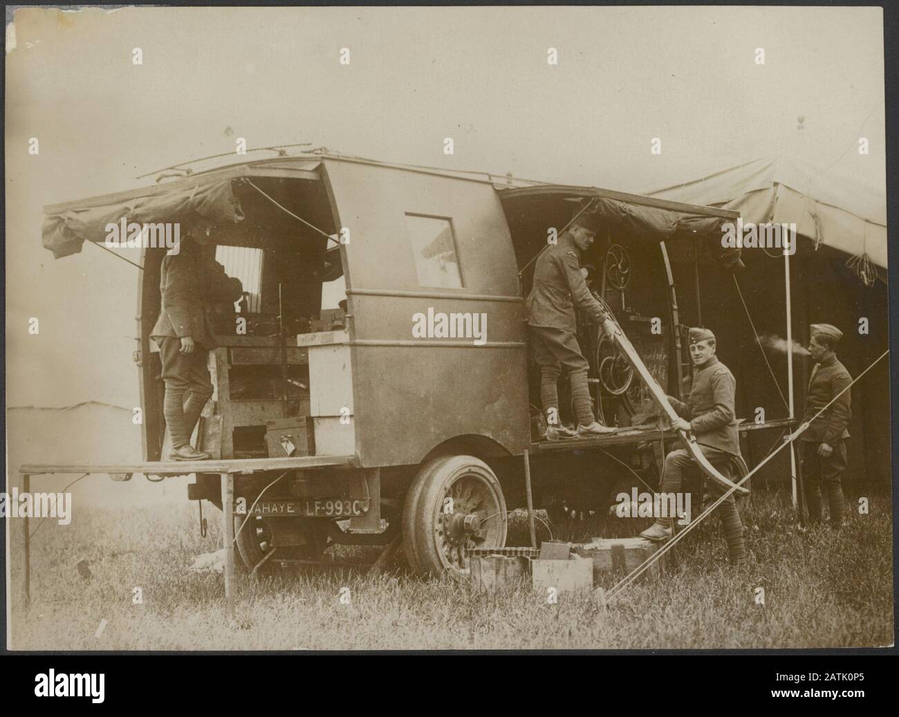 Description: German soldiers on a mobile workshop at a Delahaye truck ...