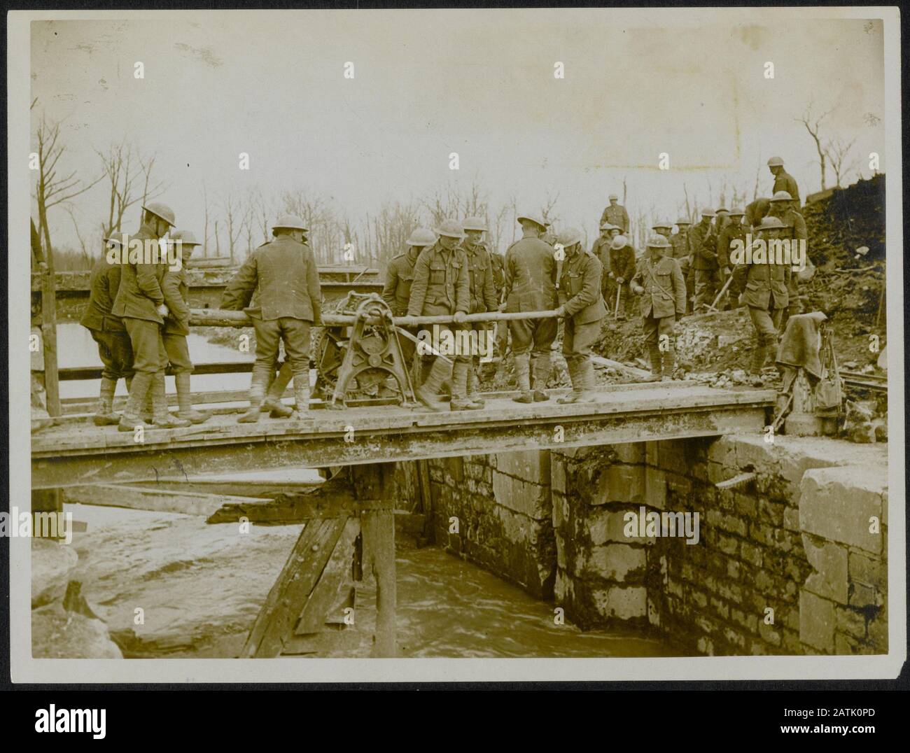 The Western Front Description: Engineers at work repairing a bridge ...