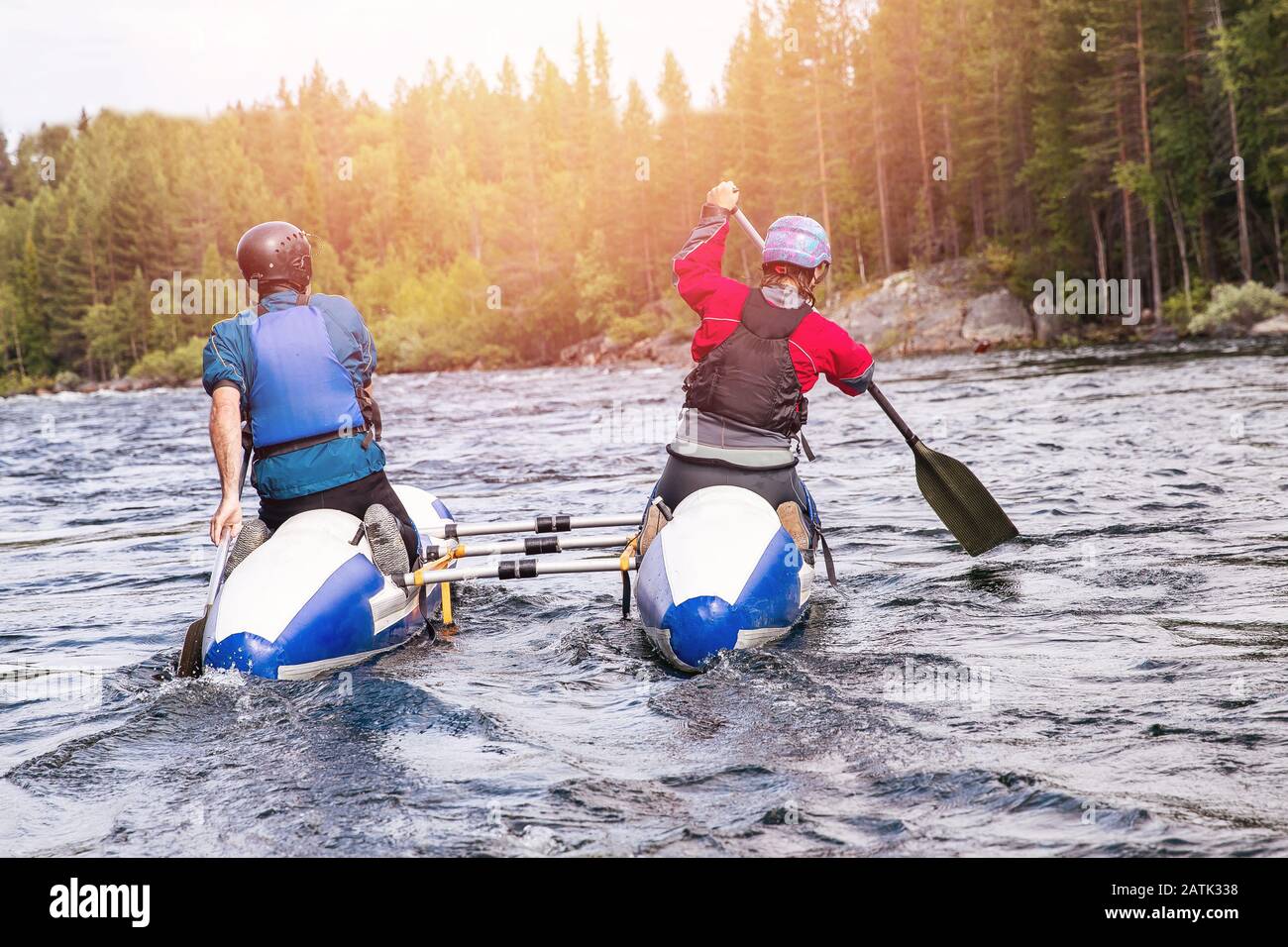Extreme couple on kayak rafting mountain river Stock Photo - Alamy