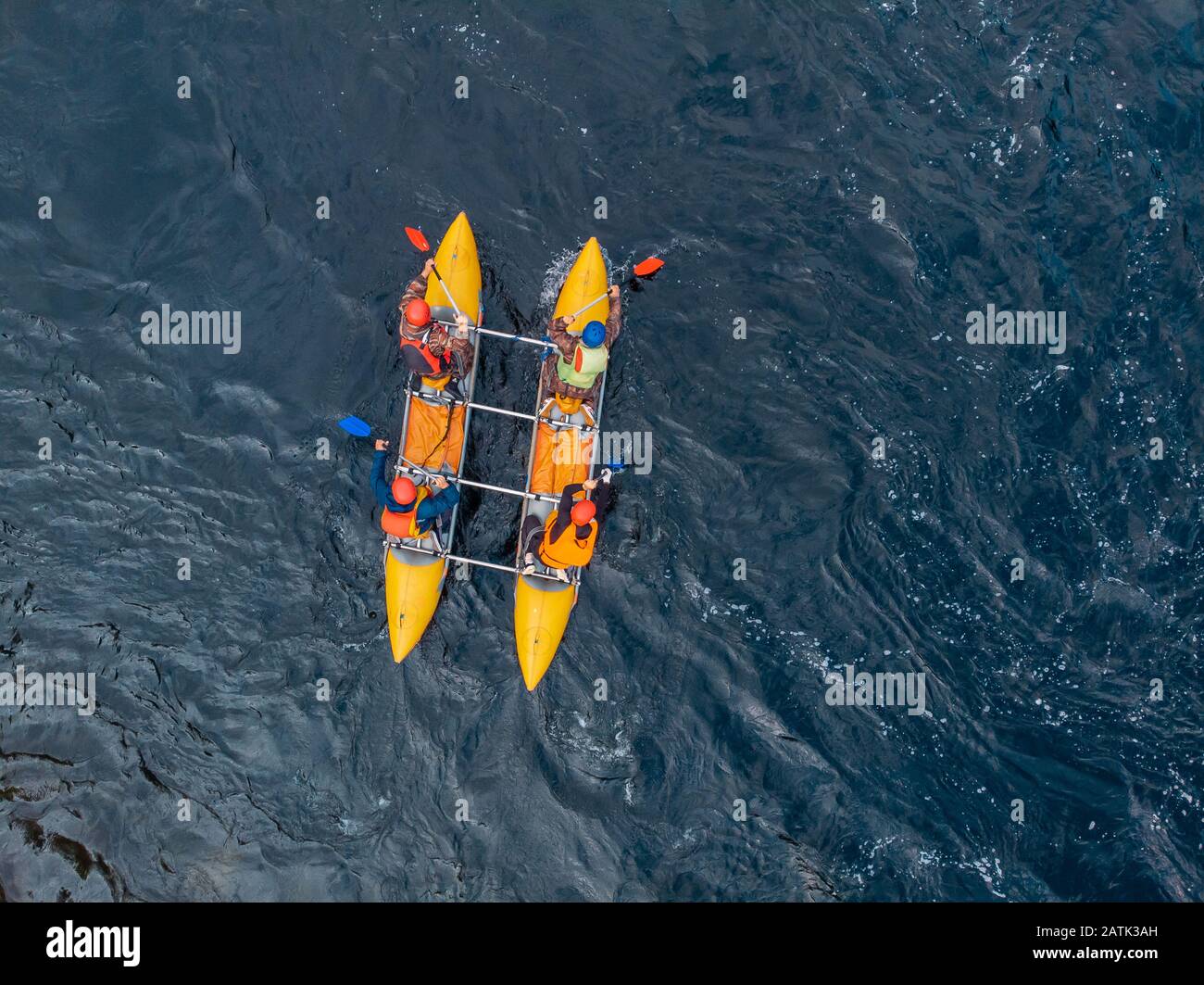 Guy in kayak sails mountain river. Whitewater kayaking, extreme sport ...