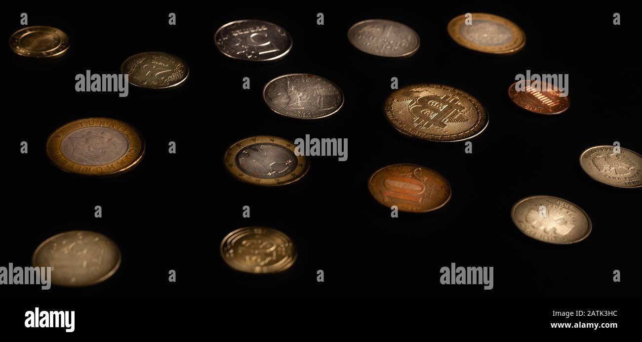 Set of different coins on a black background. Stock photo assortment of ...