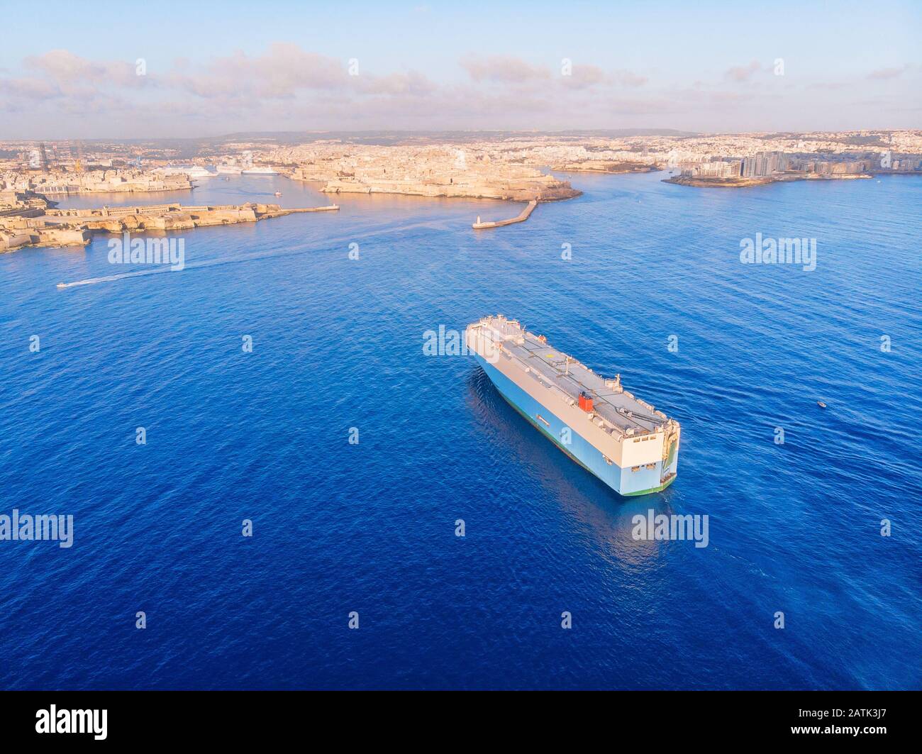 Car carrier shipping out trade port Valetta, Malta. Aerial top view ...