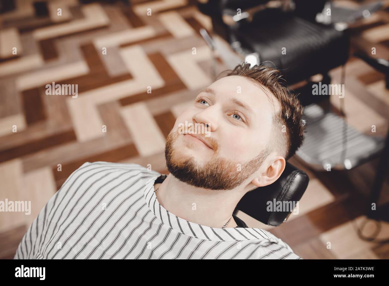 Face massage in front of dangerous royal shave. Beard and mustache ...