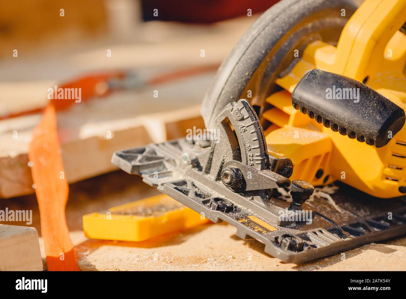 Male carpenter using circular saw hi-res stock photography and images ...