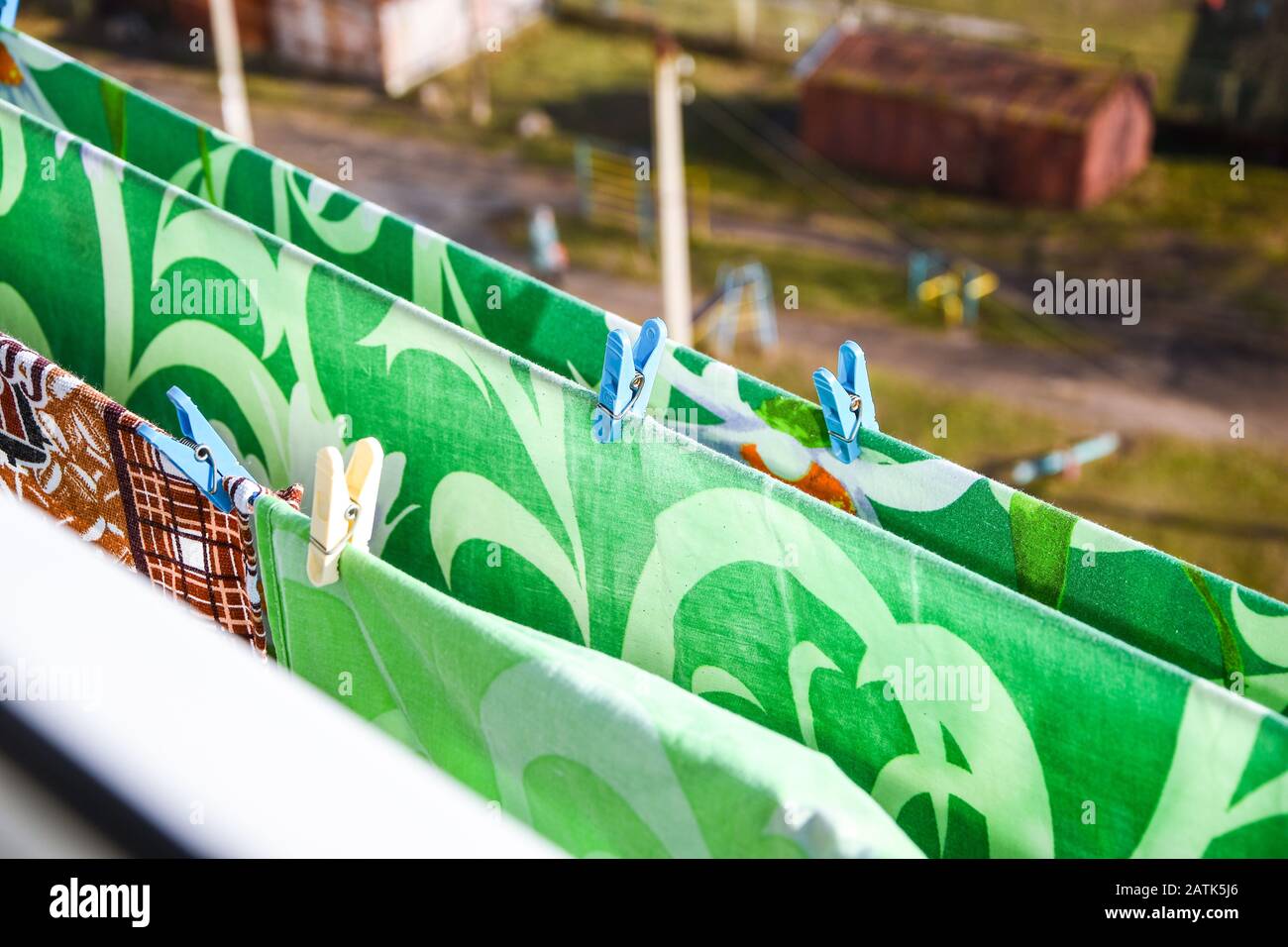 Waschespinne, Hung up to Dry, Clothes dry on a rope in the balcony ...