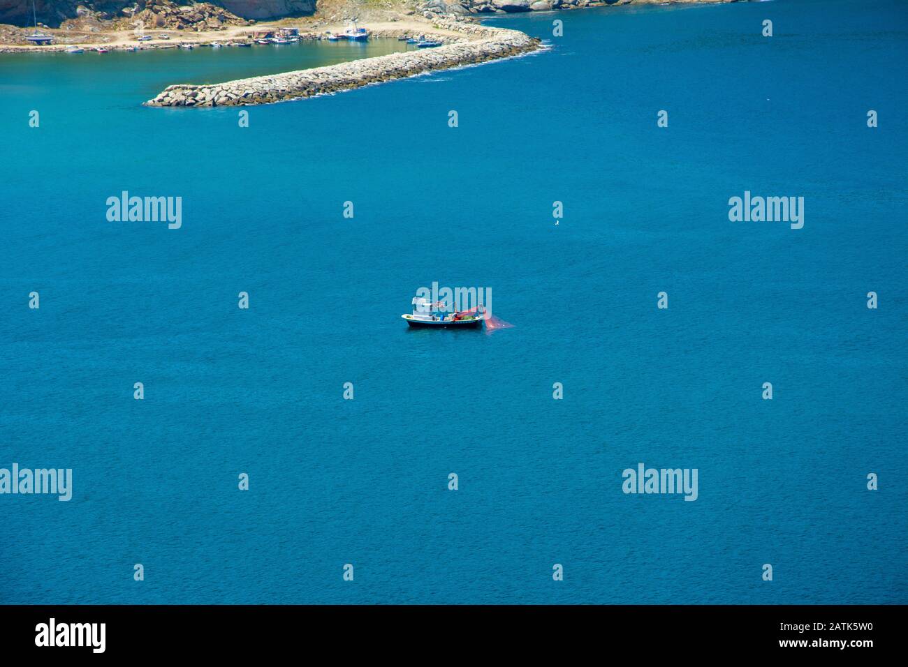 Small traditional fishing boat in the sea Stock Photo - Alamy