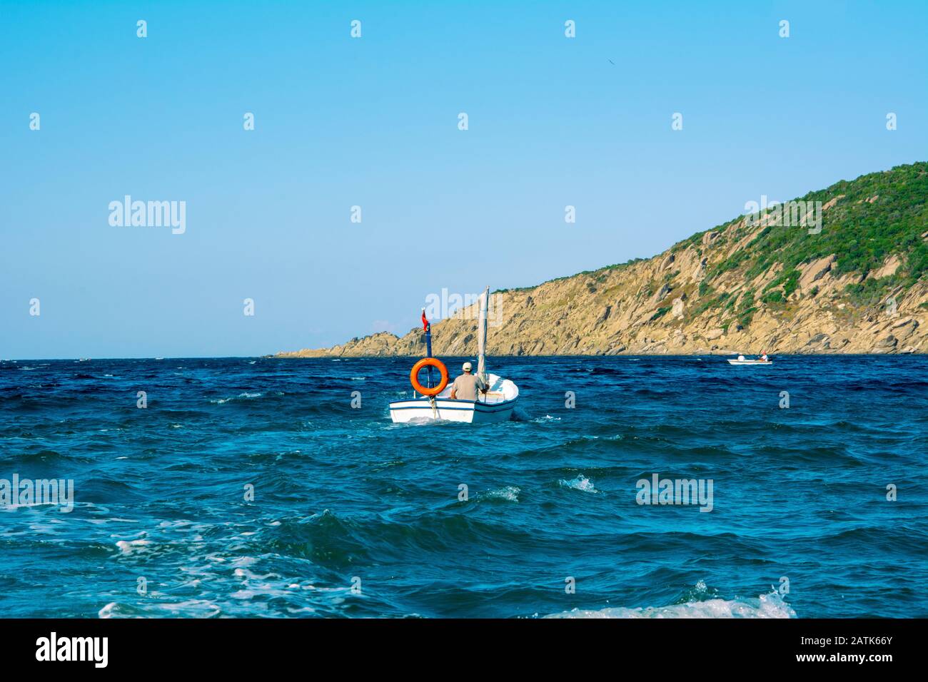 Small traditional fishing boat in the sea Stock Photo - Alamy