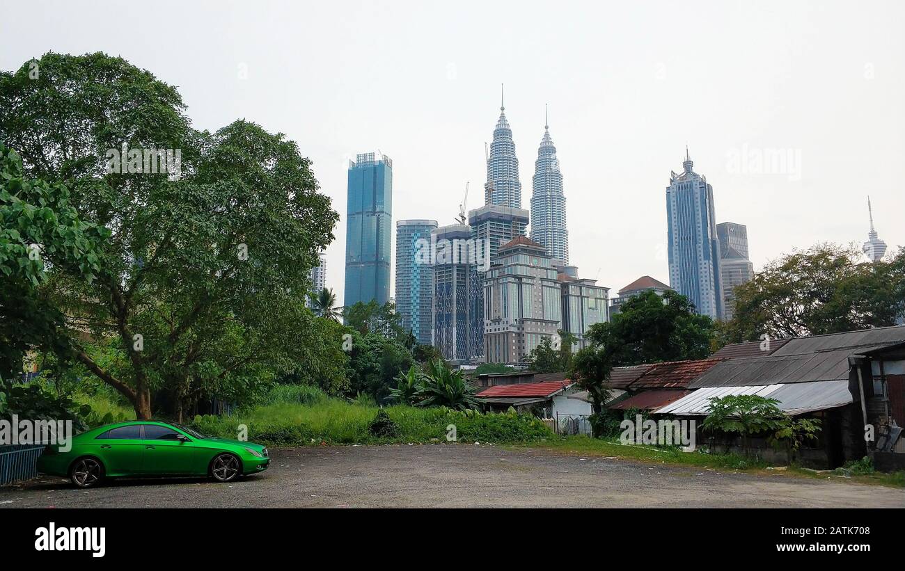 Kuala lumpur cityscape with famous Petronas twin towers Stock Photo - Alamy