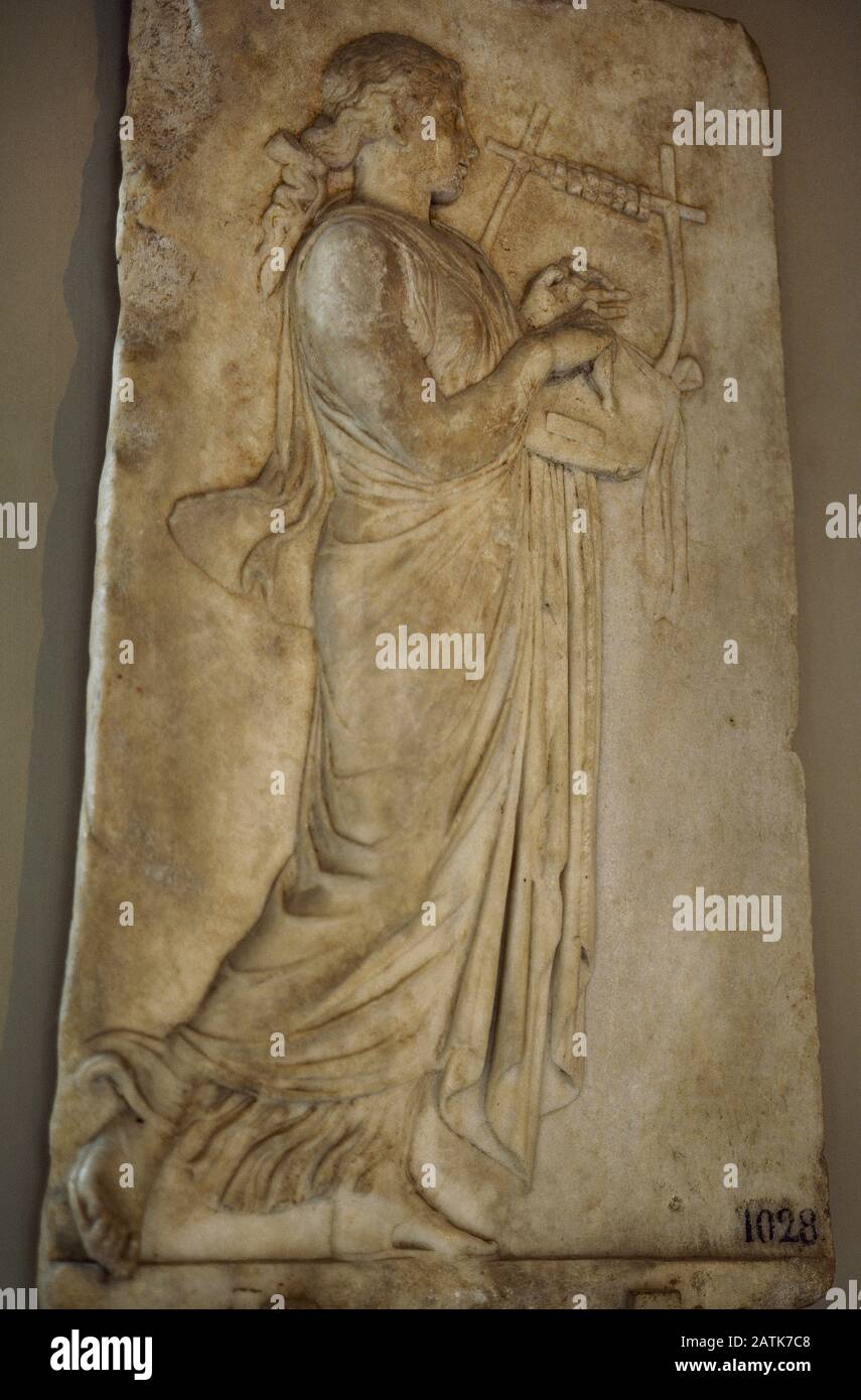 Relief depicting a Muse playing the zither. Hellenistic. 2nd century BC ...