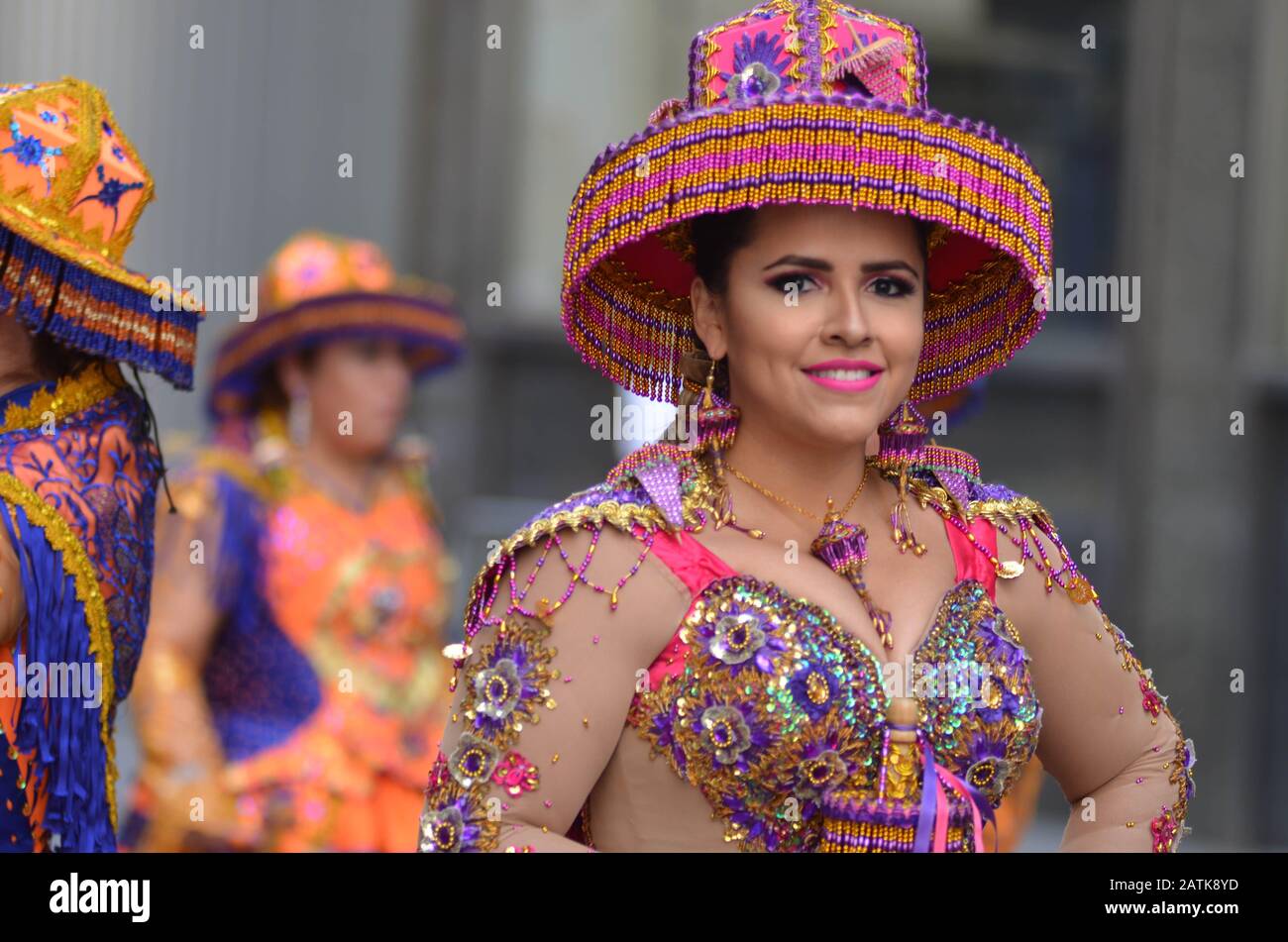A participant is seen wearing ethnic costume and marching during the ...