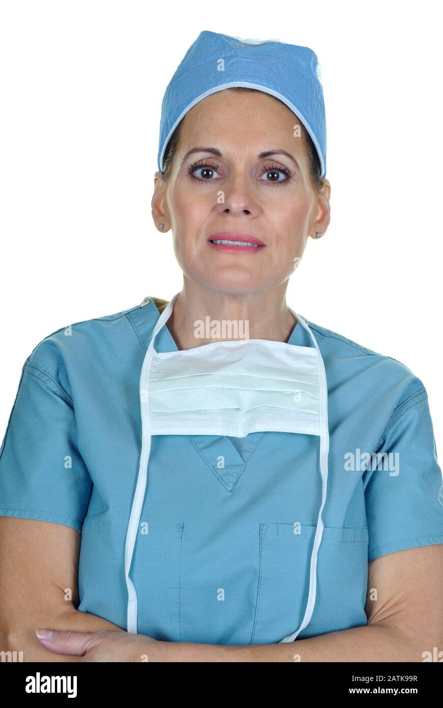 An Attractive Female Surgeon wearing surgical mask and hat Stock Photo ...