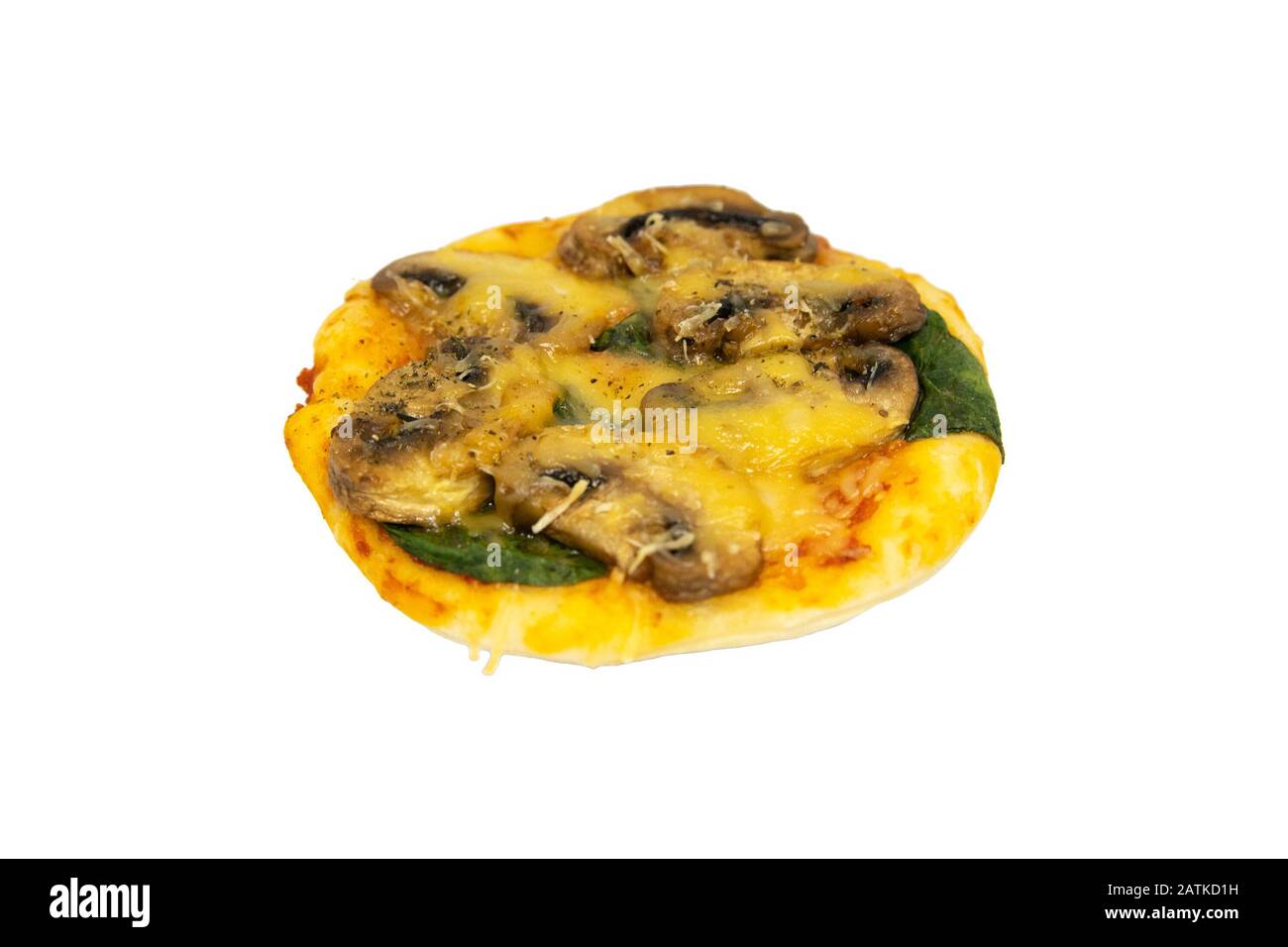 Small mini pizza with spinach, mushroom and cheese isoleted on white ...