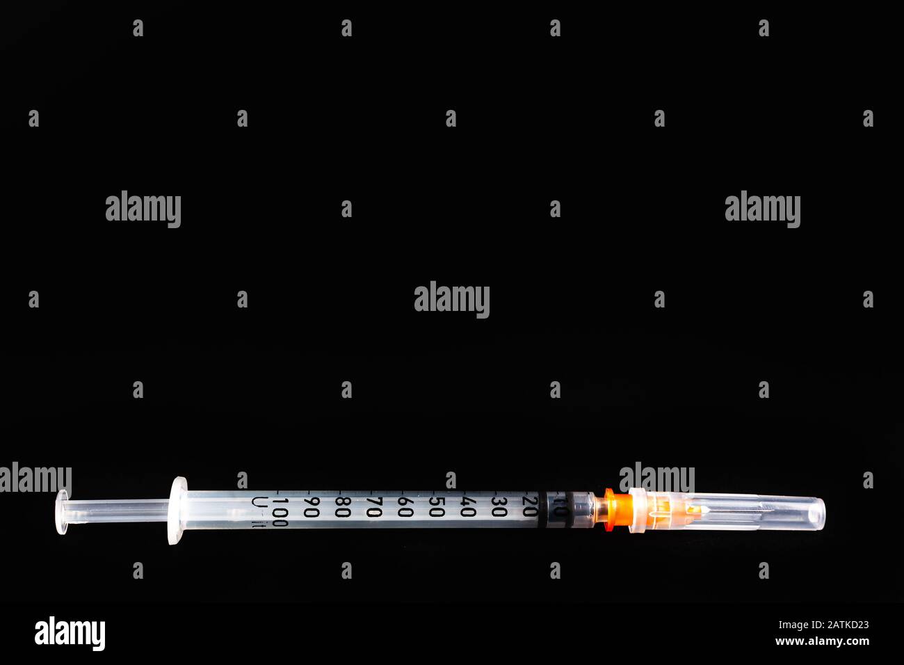 Insulin syringe on a black background with blank space Stock Photo - Alamy
