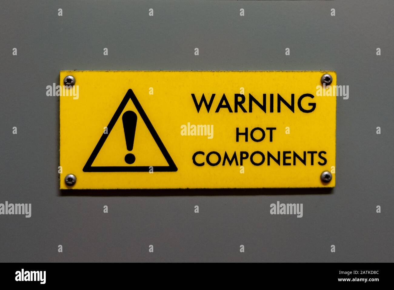 Hot components yellow warning sign Stock Photo - Alamy