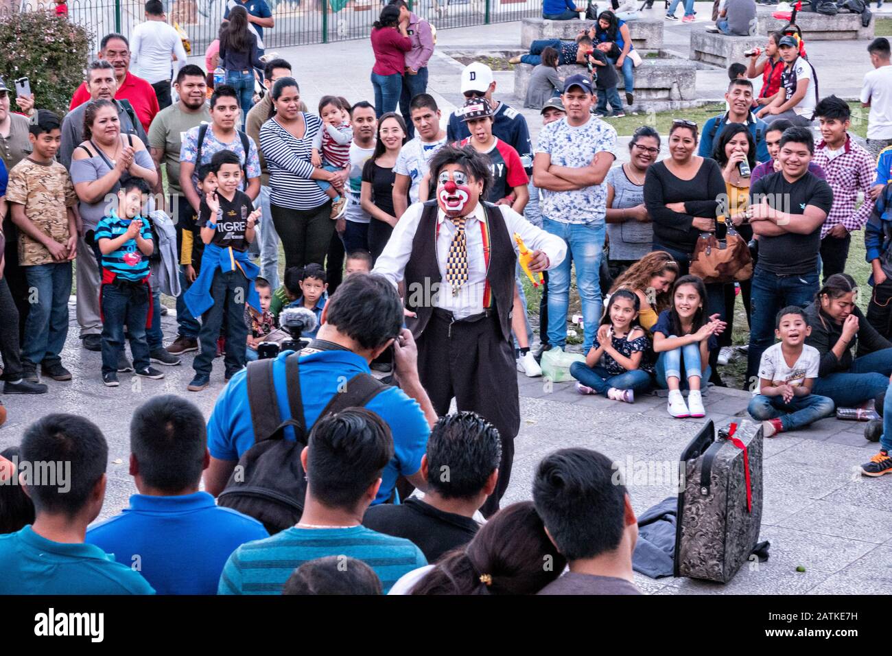 A Mexican clown performs for a crowd in the Macroplaza square in the ...