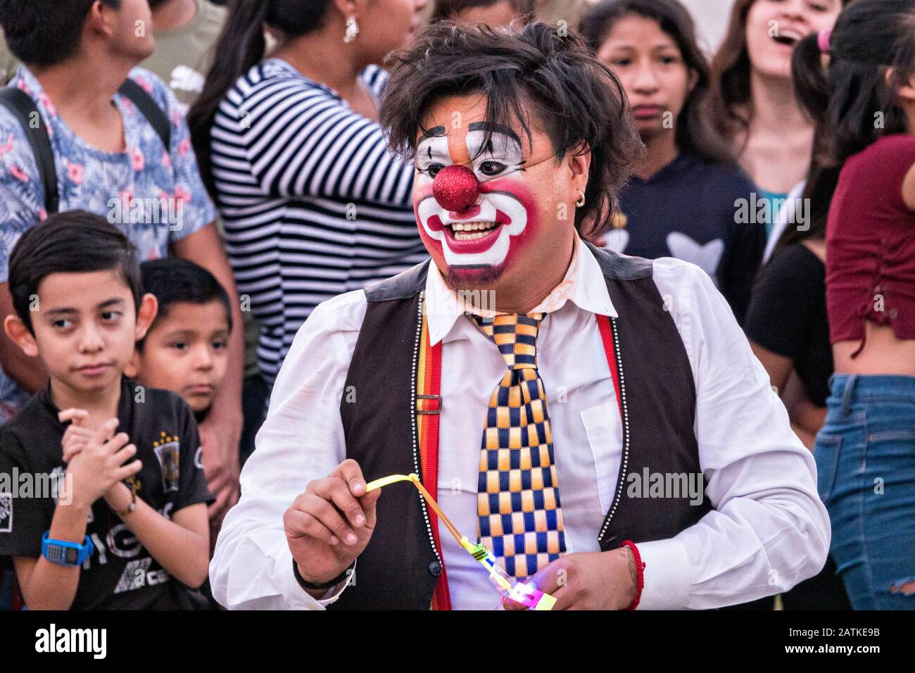 A Mexican clown performs for a crowd in the Macroplaza square in the ...