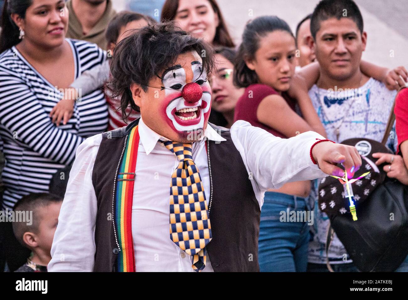 A Mexican clown performs for a crowd in the Macroplaza square in the ...